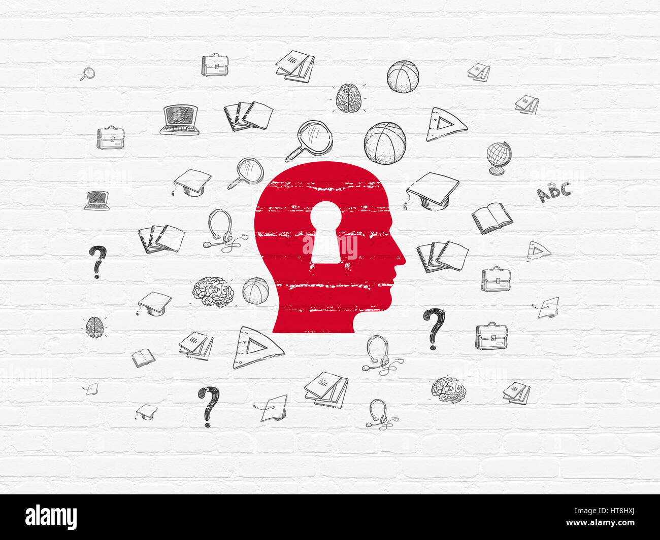 Studying concept: Head With Keyhole on wall background Stock Photo - Alamy