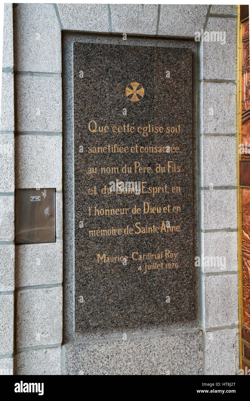 Plaque at the front entrance to the Basilica of Sainte-Anne-de-Beaupré ...