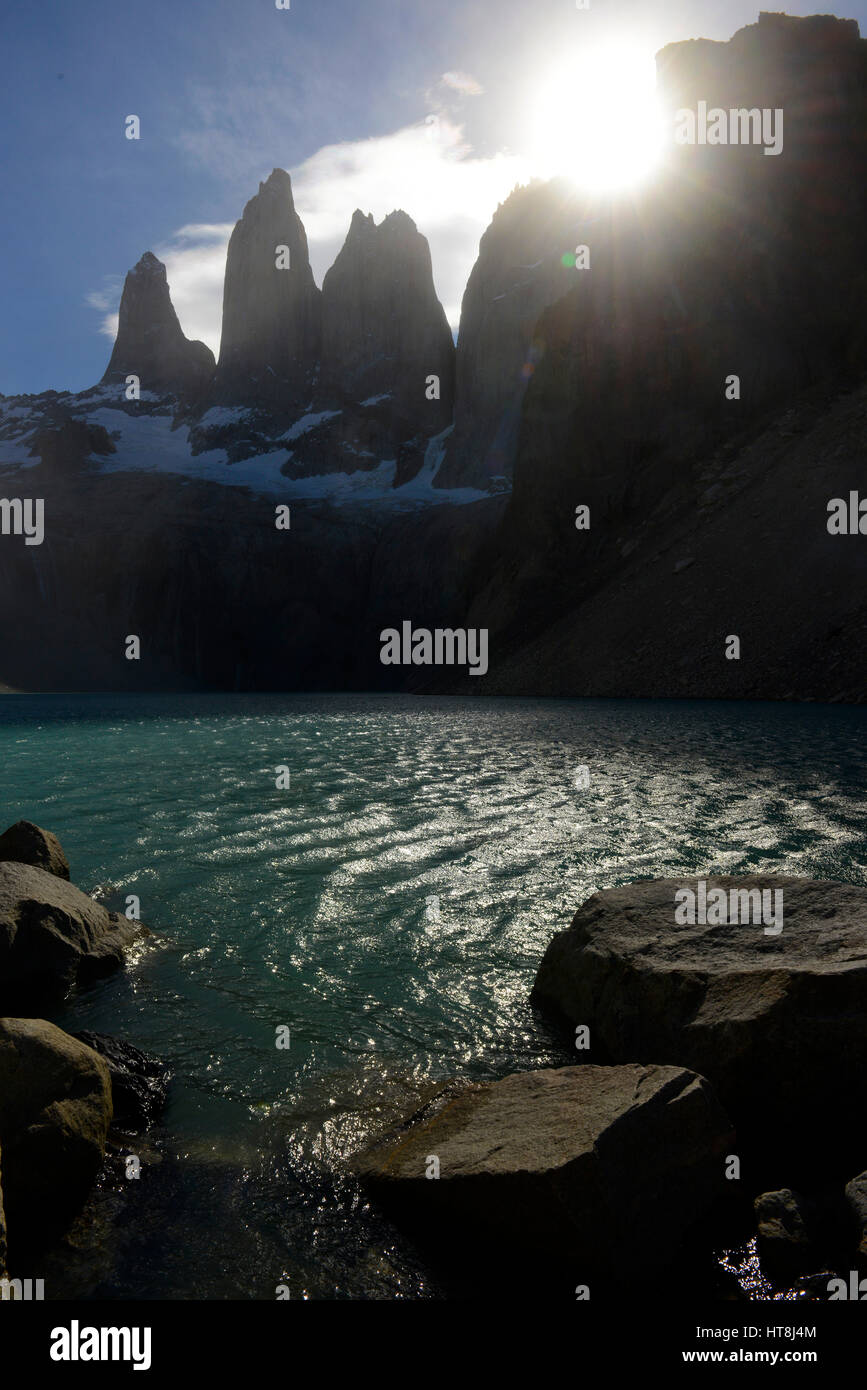 Evening sunlight bursts through mountains of Torres del Paine (Towers ...