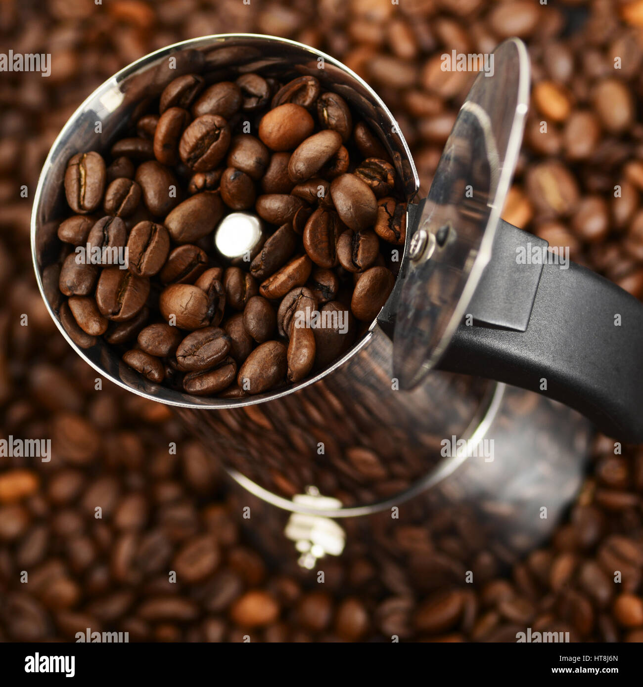 coffee beans in espresso machine top view Stock Photo - Alamy