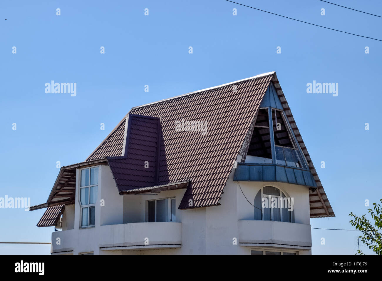 Detached house with a roof made of steel sheets. Roof metal sheets ...