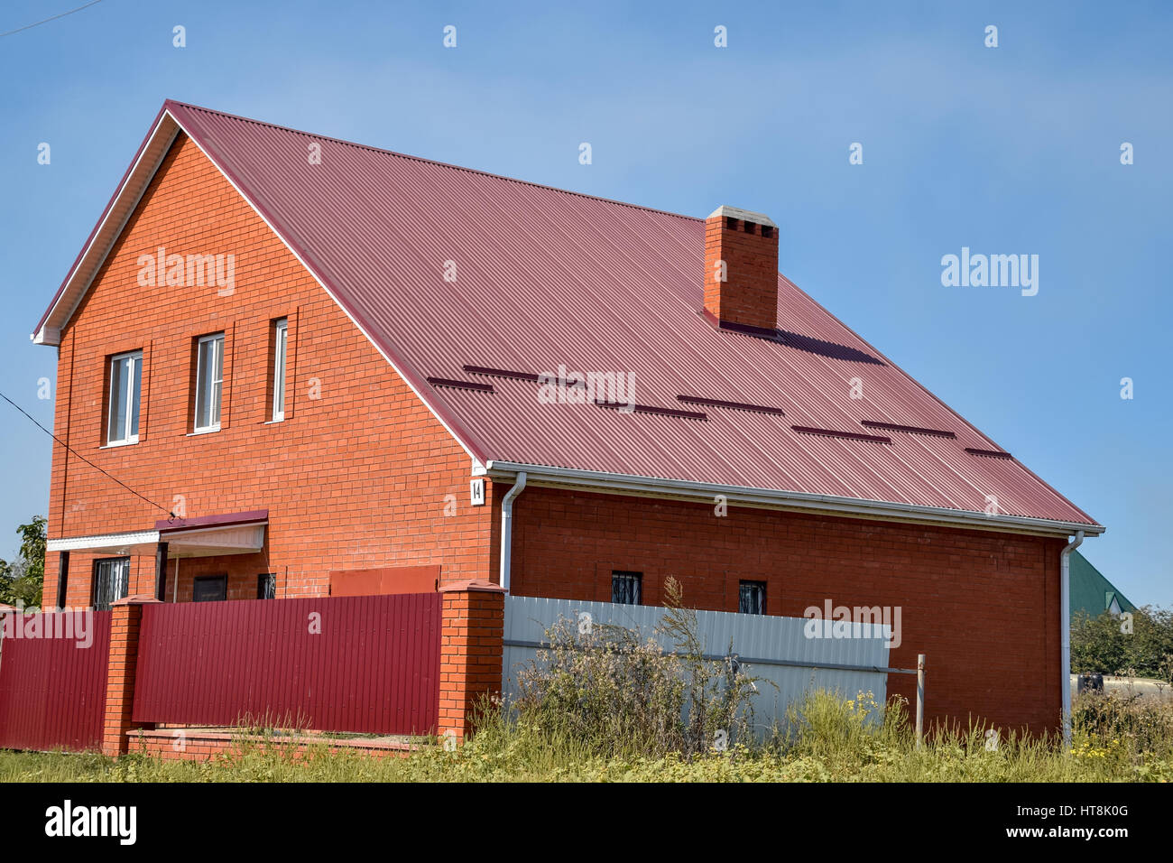 Detached house with a roof made of steel sheets. Roof metal sheets ...