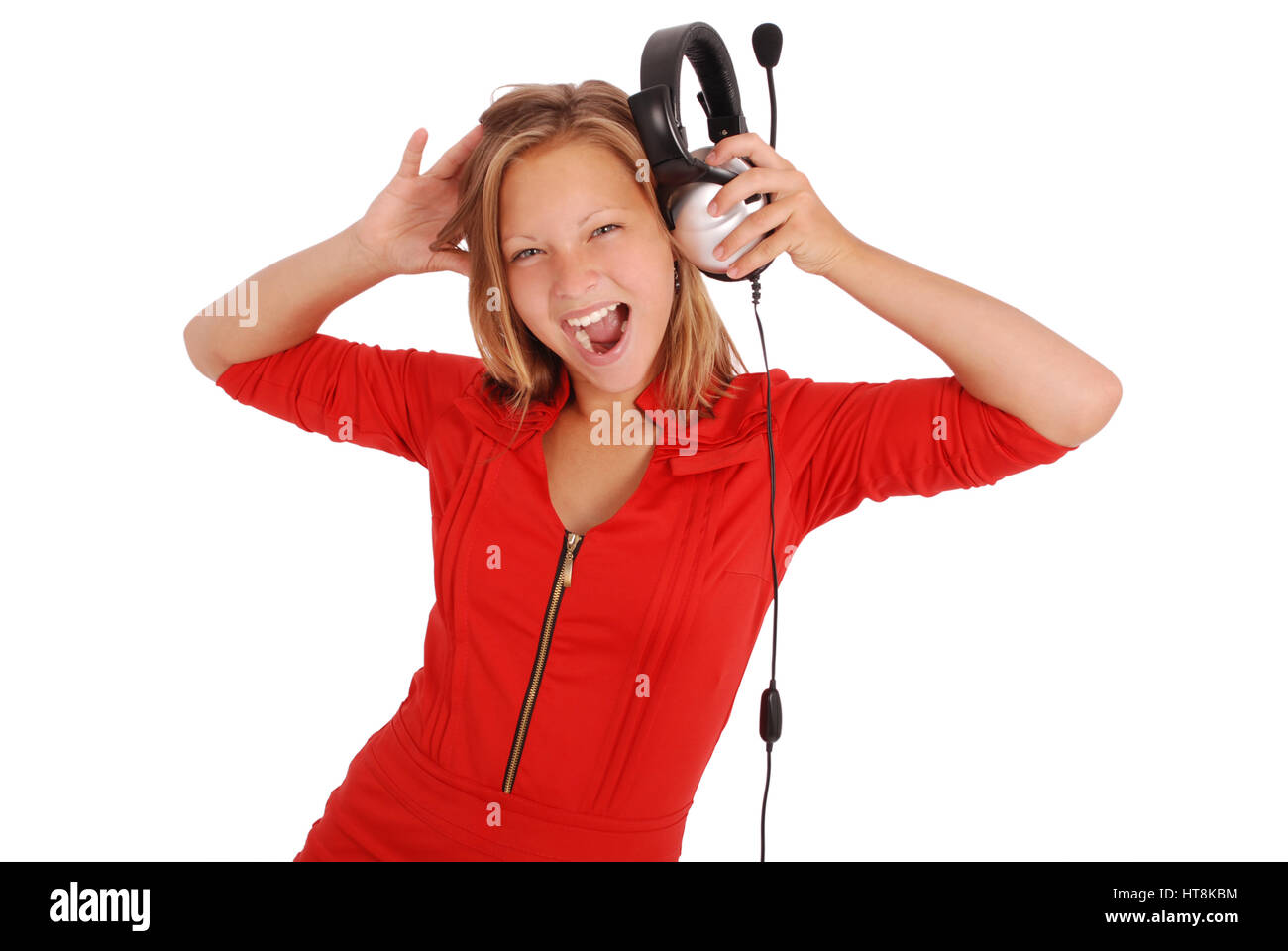 Lovely girl listening a music with headphones, white background Stock ...