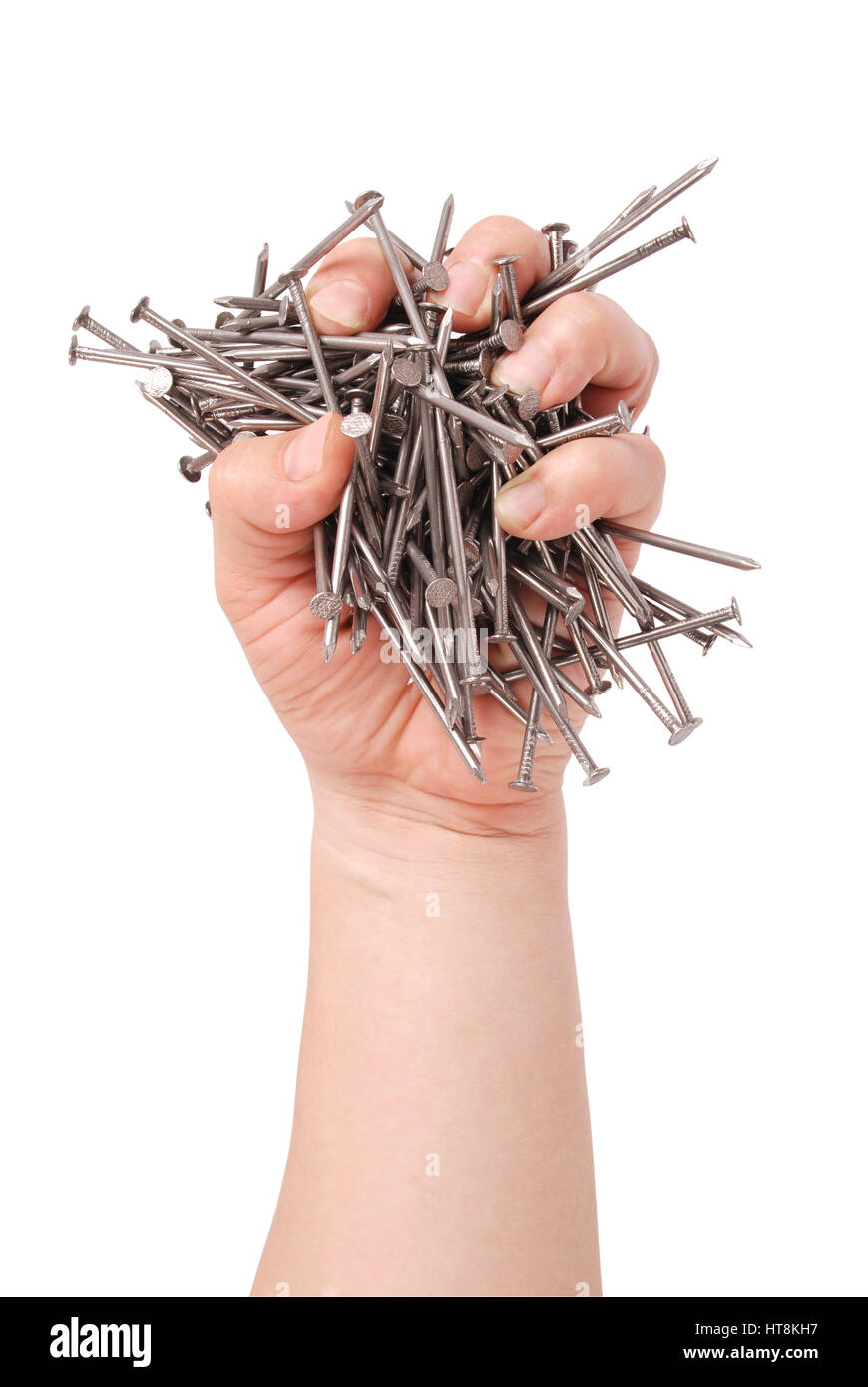 Man's hand holding metal nails. Closeup with clipping path isolated on ...