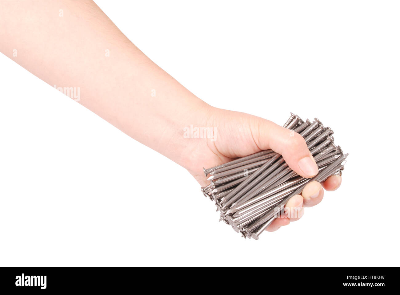 Man's hand holding metal nails. Closeup with clipping path isolated on ...