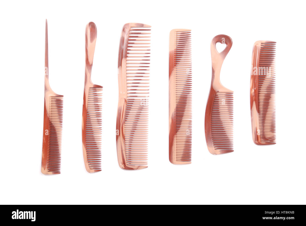Set of brown plastic comb isolated on white background Stock Photo - Alamy
