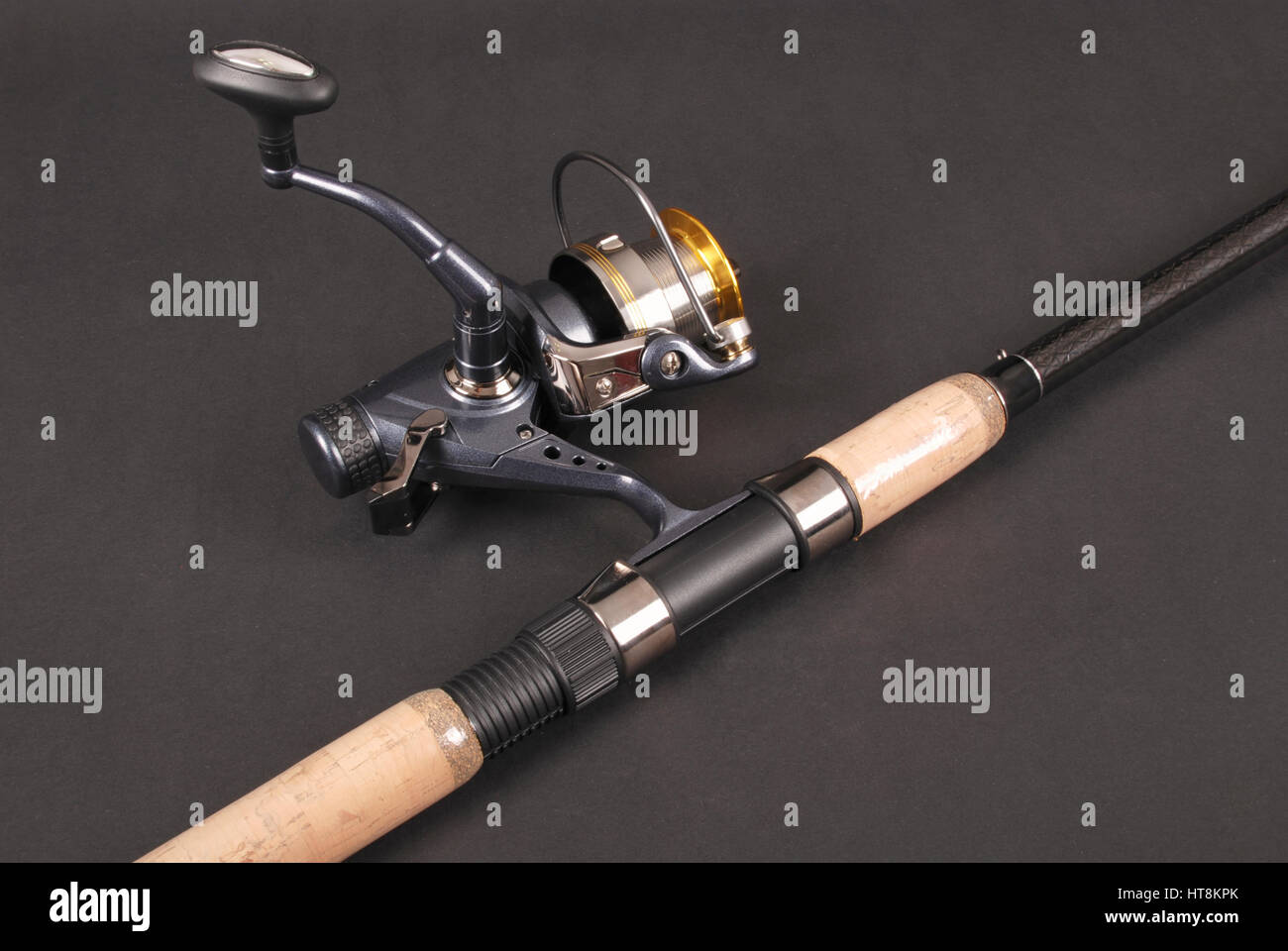 Fishing rod on black background with soft shadow Stock Photo - Alamy