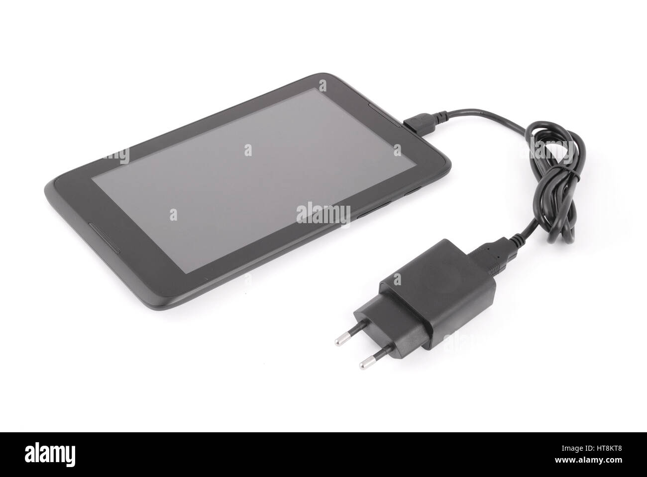 Charging devices and tablet pc isolated white background with soft ...