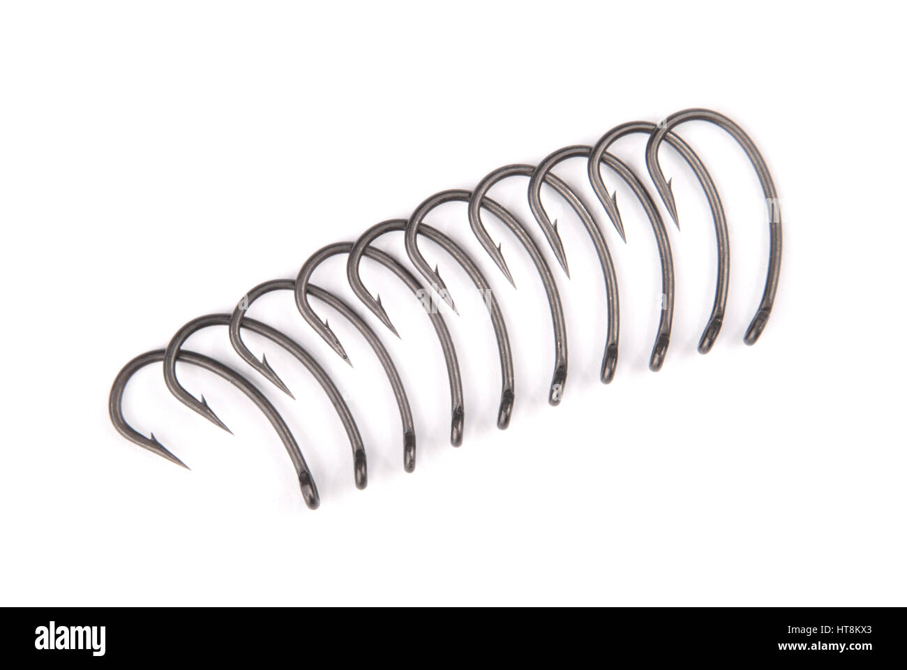 Sharp steel fishing hooks isolated on white background with soft shadow ...