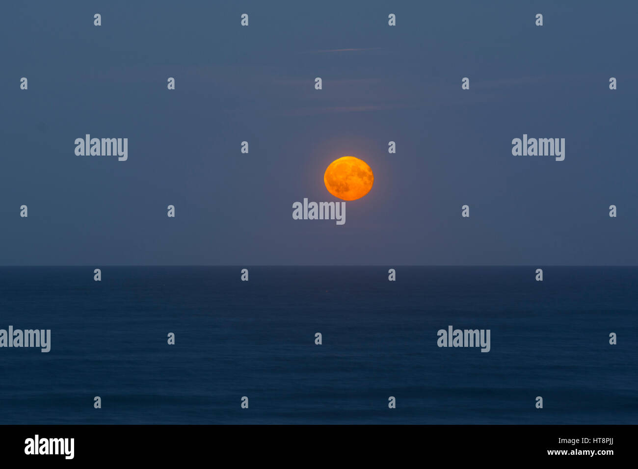 Moon Rising Over The Sea High Resolution Stock Photography and Images ...