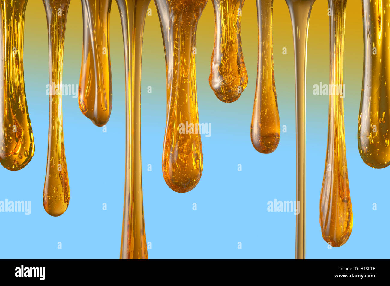 Golden syrup or treacle dripping Stock Photo - Alamy
