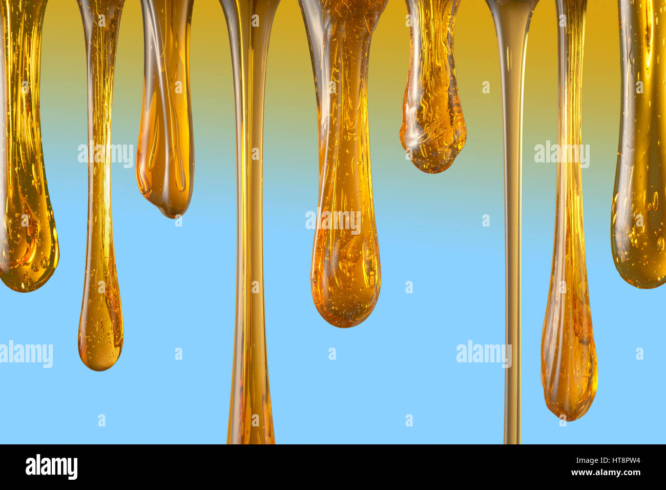 Golden syrup or treacle dripping Stock Photo - Alamy