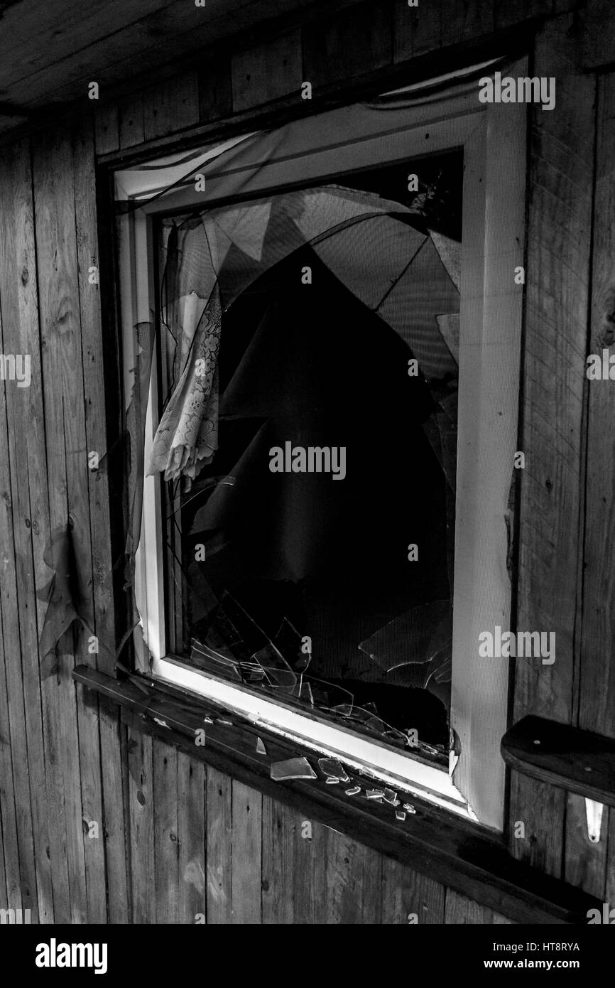 Old creepy dark abandoned destructive dirty house with broken windows ...