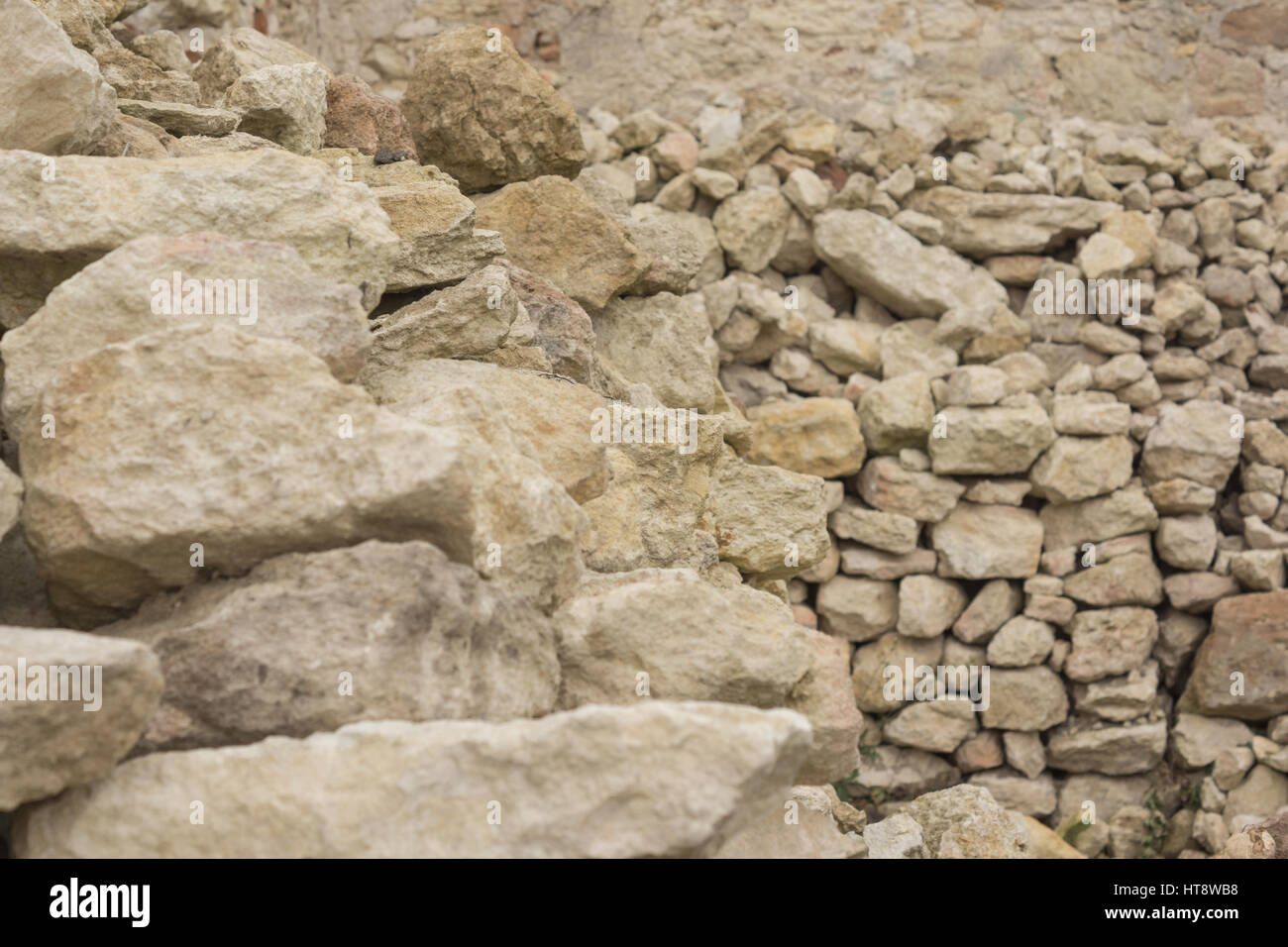 pile of bricks made from white limestone for renovation of medieval ...
