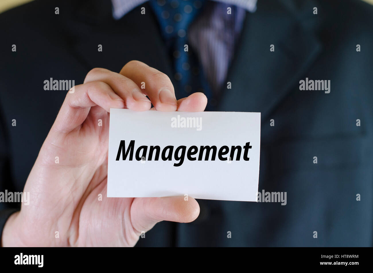Management text note concept over businessman background Stock Photo ...