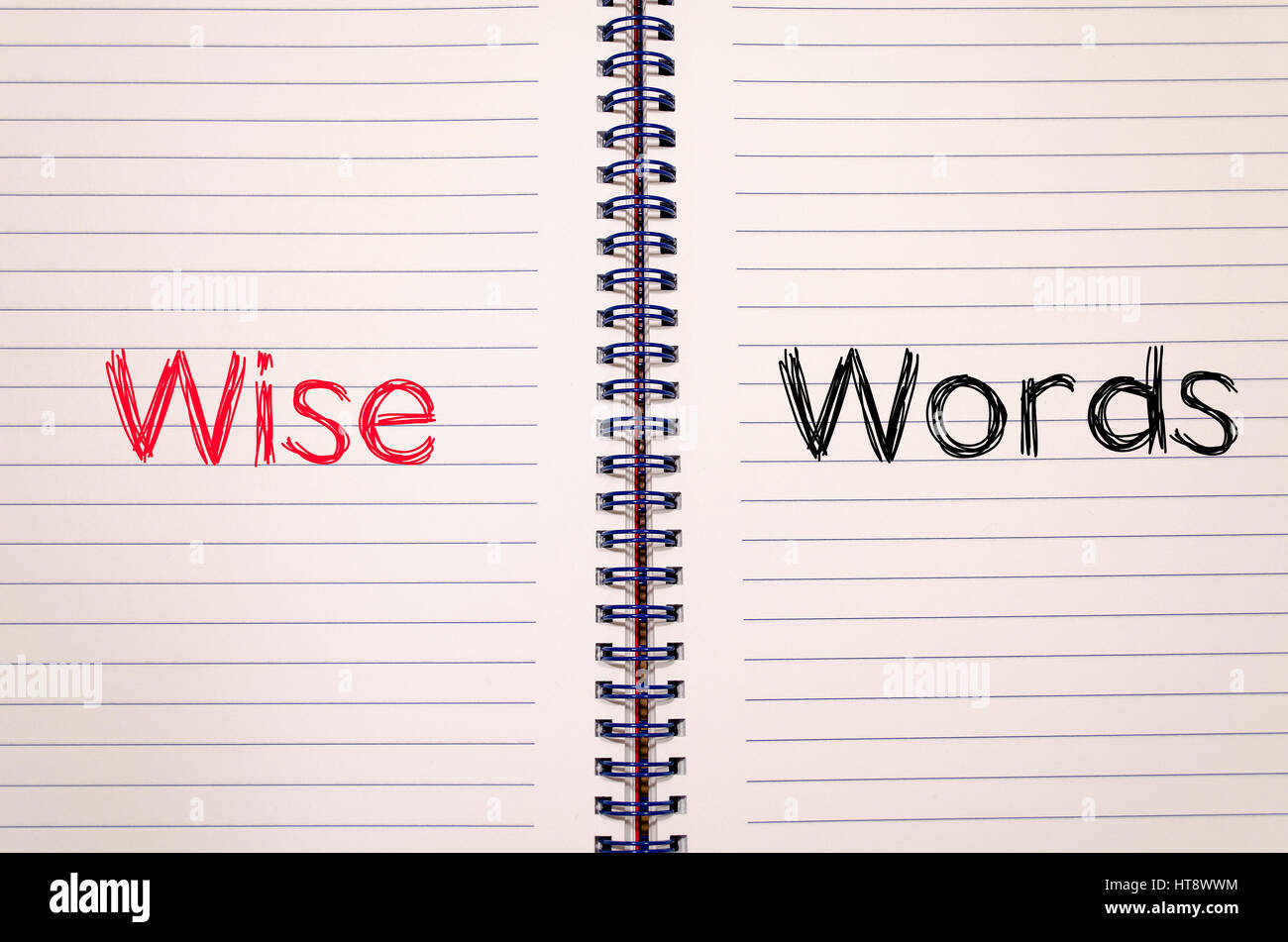 Wise words text concept write on notebook Stock Photo - Alamy