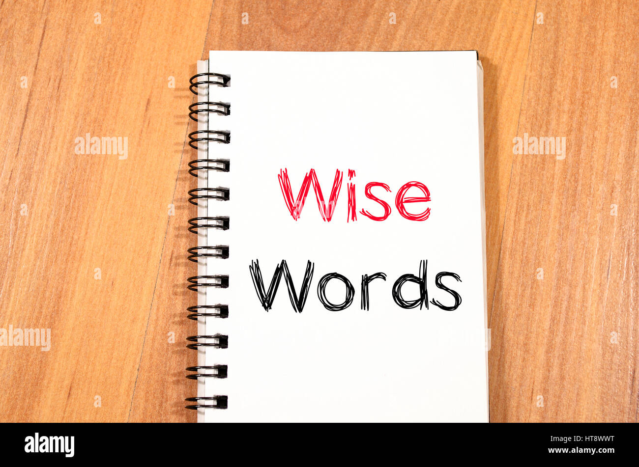 Wise words text concept write on notebook Stock Photo - Alamy