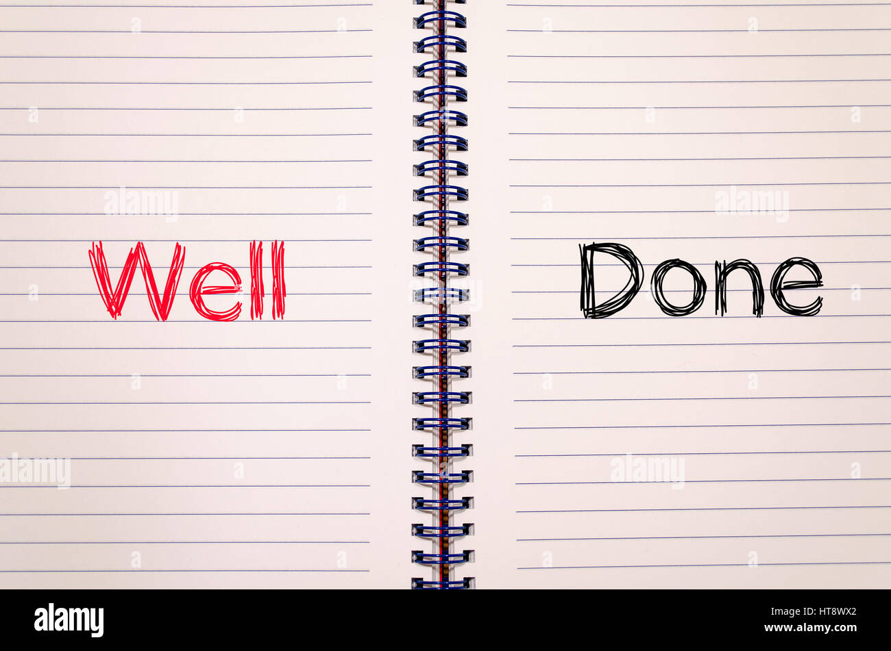 Well done text concept write on notebook Stock Photo - Alamy