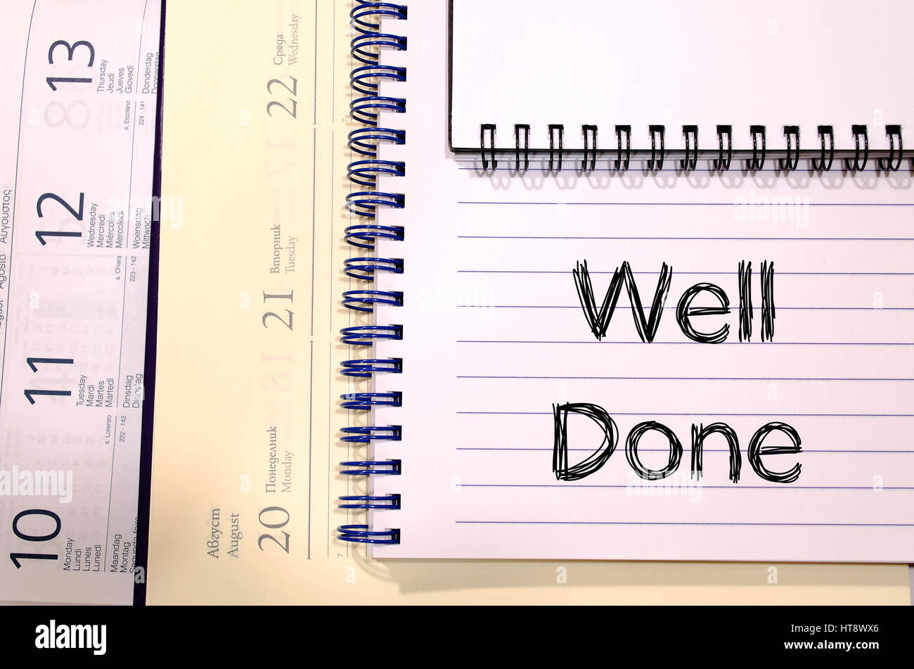 Well done text concept write on notebook Stock Photo - Alamy