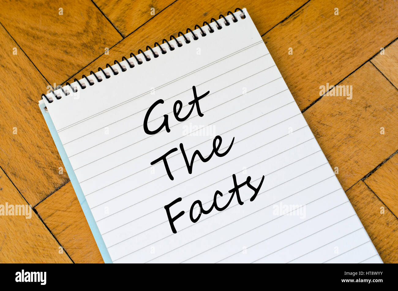 Get the facts text concept write on notebook Stock Photo - Alamy
