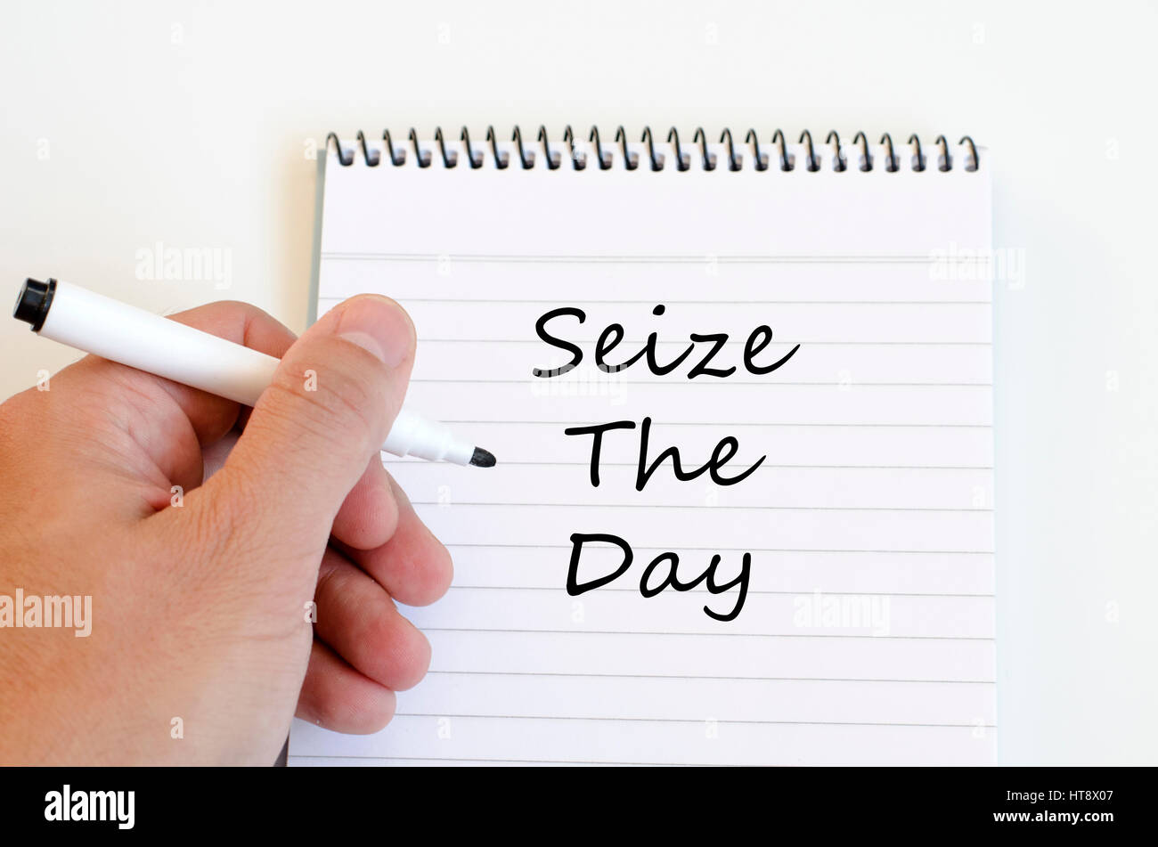 Seize the day text concept write on notebook Stock Photo - Alamy