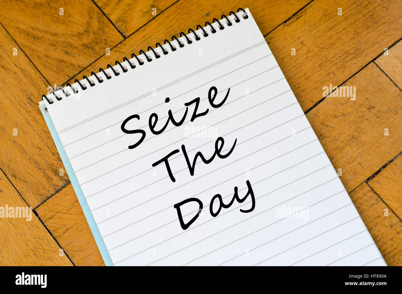 Seize the day text concept write on notebook Stock Photo - Alamy