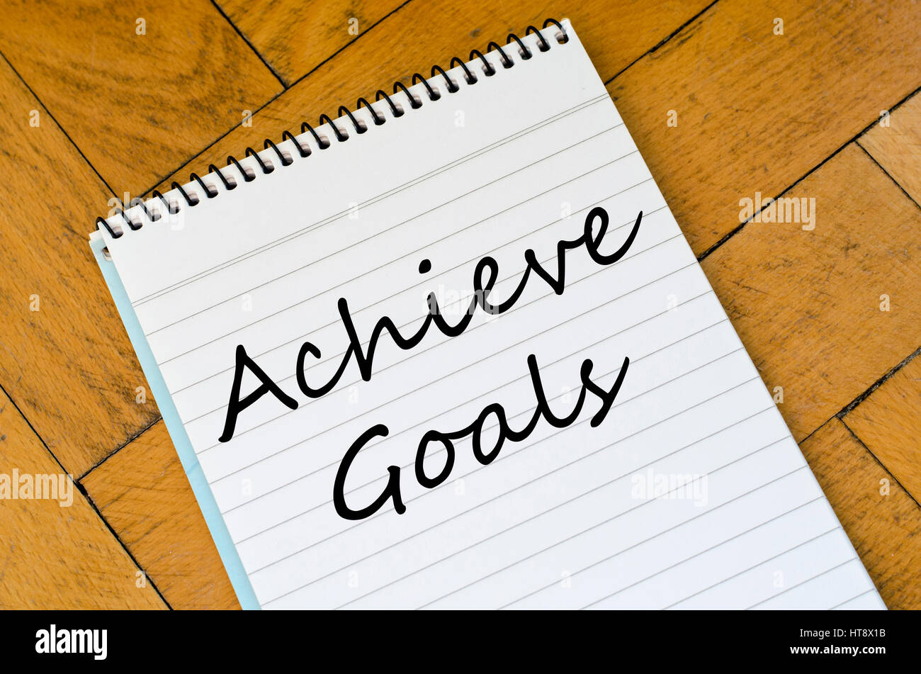 Achieve goals text concept write on notebook Stock Photo - Alamy