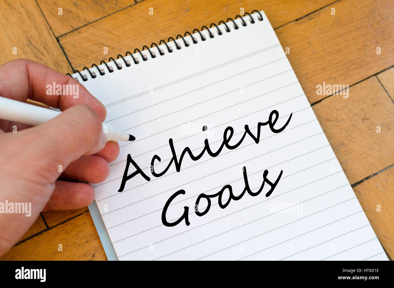 Achieve goals text concept write on notebook Stock Photo - Alamy