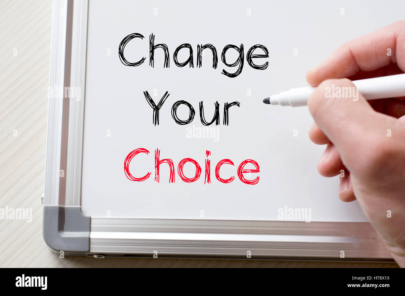 Human hand writing change your choice on whiteboard Stock Photo - Alamy