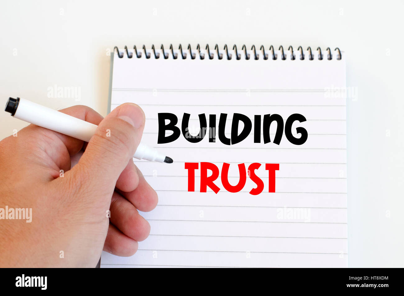 Building trust text concept isolated over white background Stock Photo ...