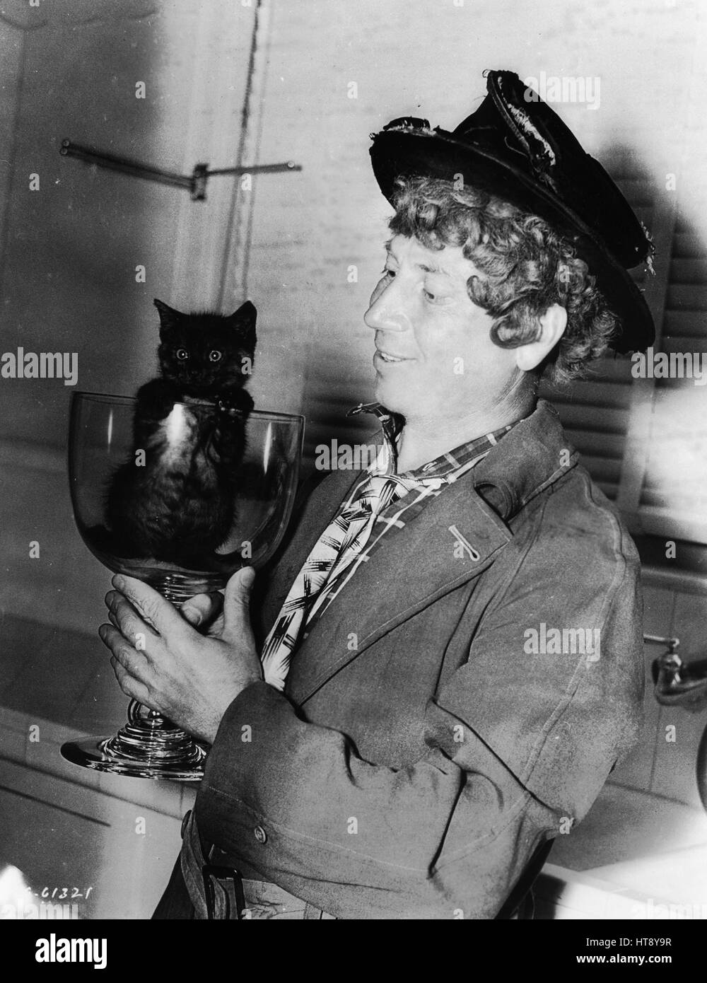 "At home with the versatile Harpo Marx. Harpo is now enjoying a ...