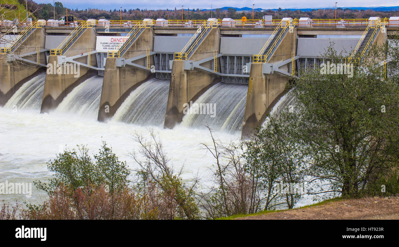 Weir Gates Releasing Water Stock Photo - Alamy