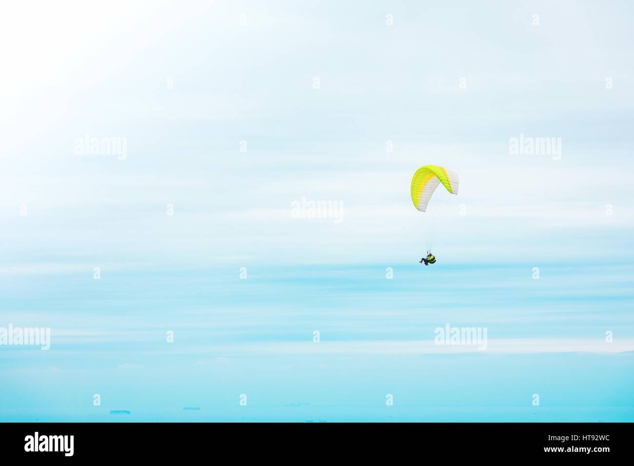 Paragliding above the ocean in Hong Kong East Stock Photo - Alamy