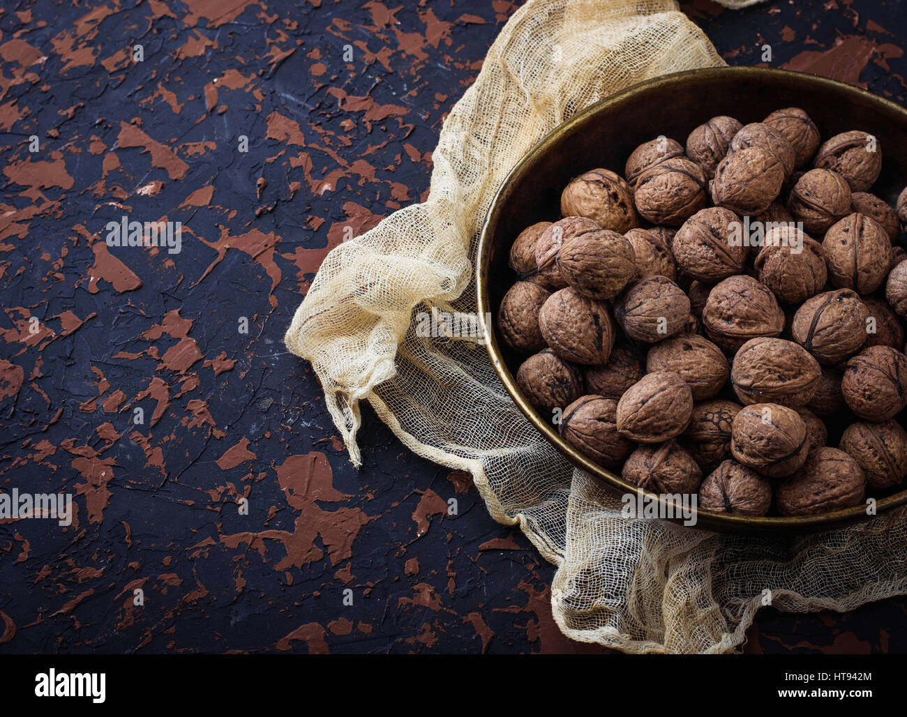 Walnuts on concrete background. Selective focus Stock Photo - Alamy