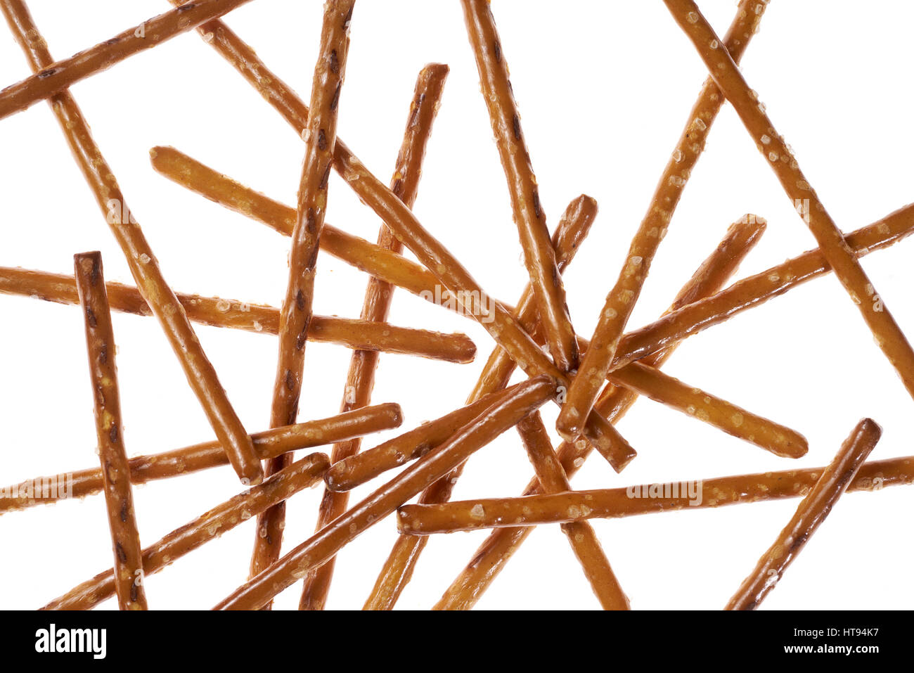 closeup of some crossed salt sticks in white back Stock Photo - Alamy