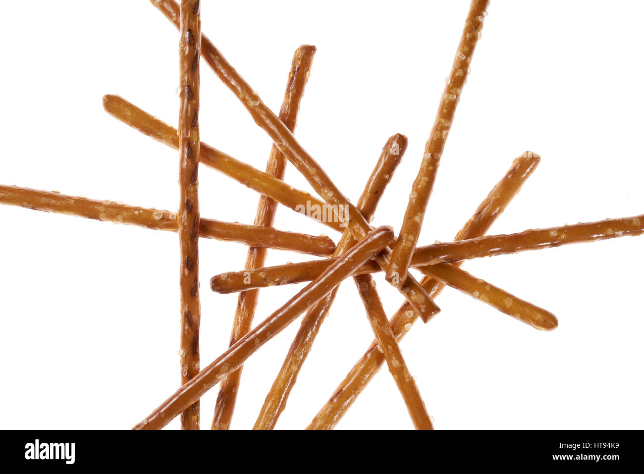 closeup of some crossed salt sticks in white back Stock Photo - Alamy