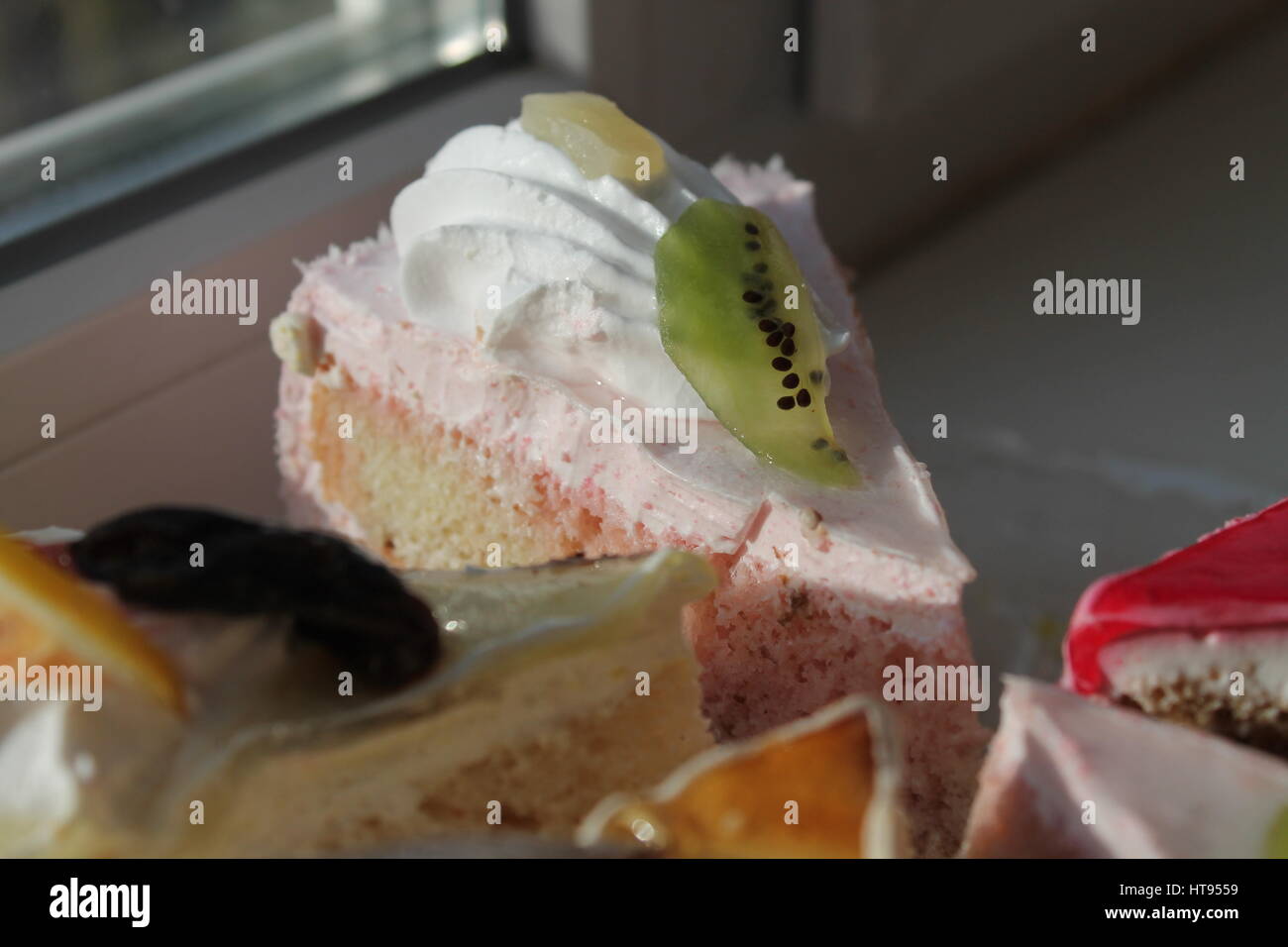 beautiful colorful cream cake with jelly and chocolate decorated fresh ...