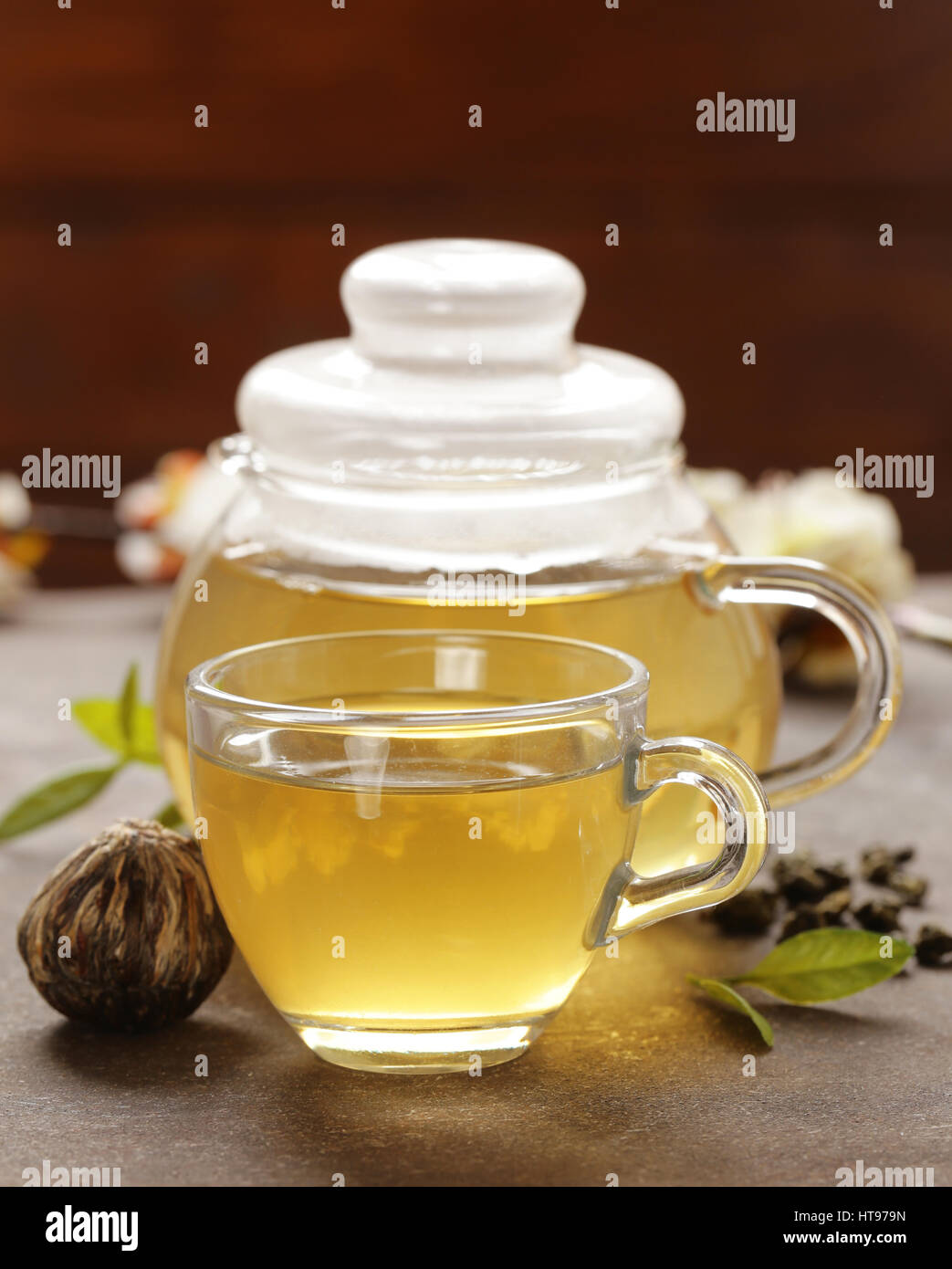 Traditional green tea in a kettle on the table Stock Photo - Alamy