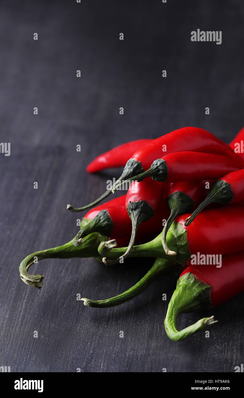 Seasoning. Red chili pepper on the table Stock Photo - Alamy