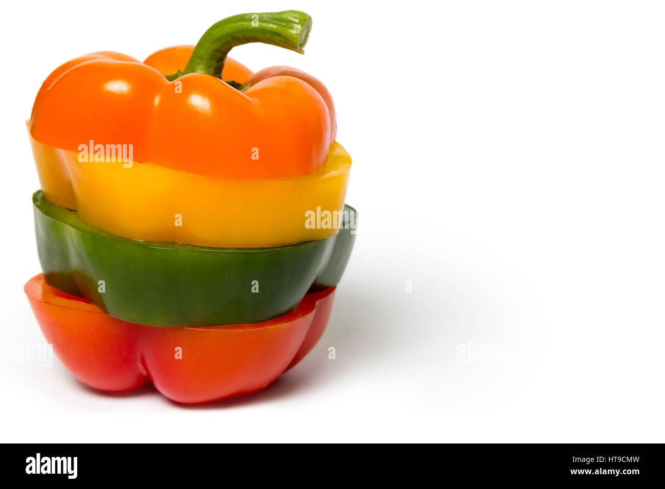 A selection of colorful sweet peppers sliced in pieces to make one ...