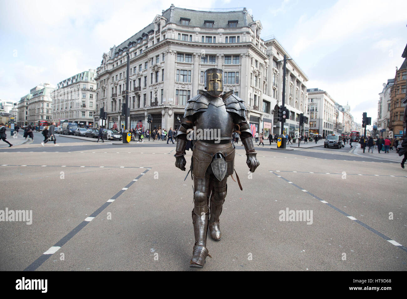 EDITORIAL USE ONLY A seven foot man dressed as a Knight in armour in ...