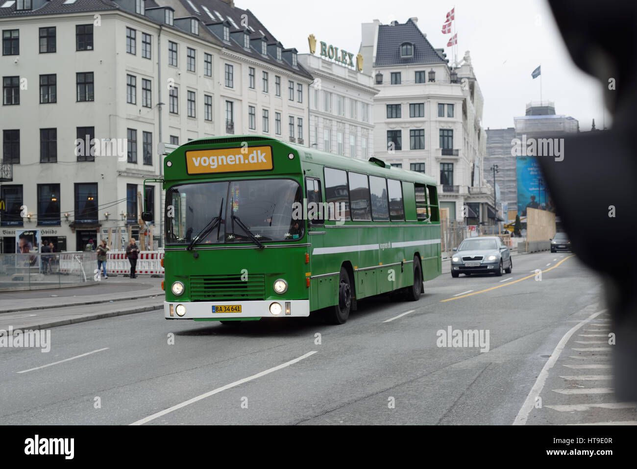 Green bus on the street of Copenhagen, Demnark Stock Photo - Alamy