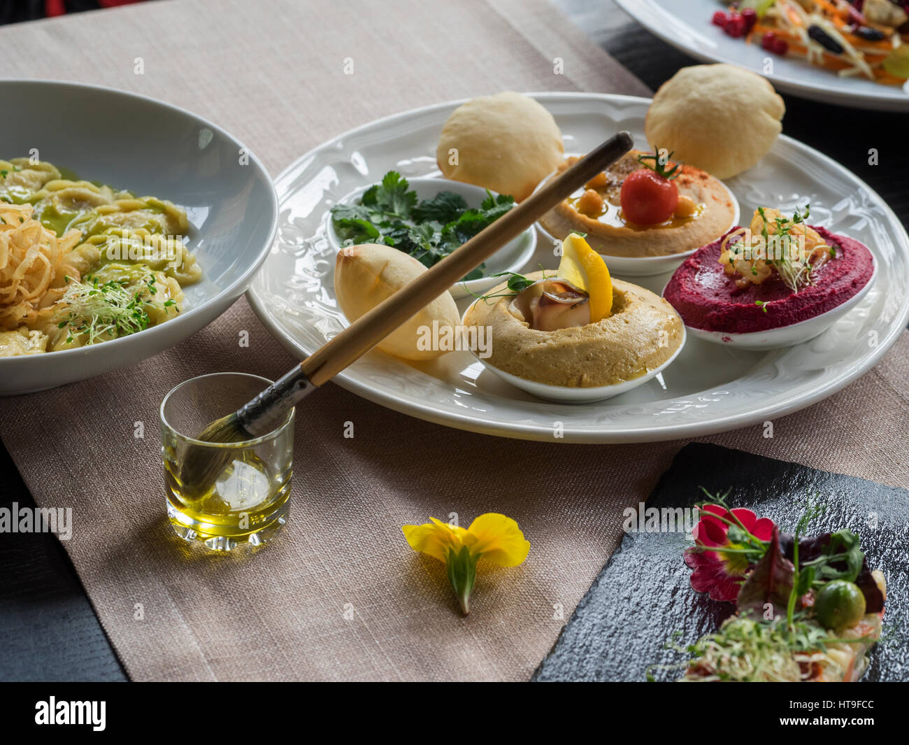 Dishes on the table, prepared for shooting by the food photographer ...