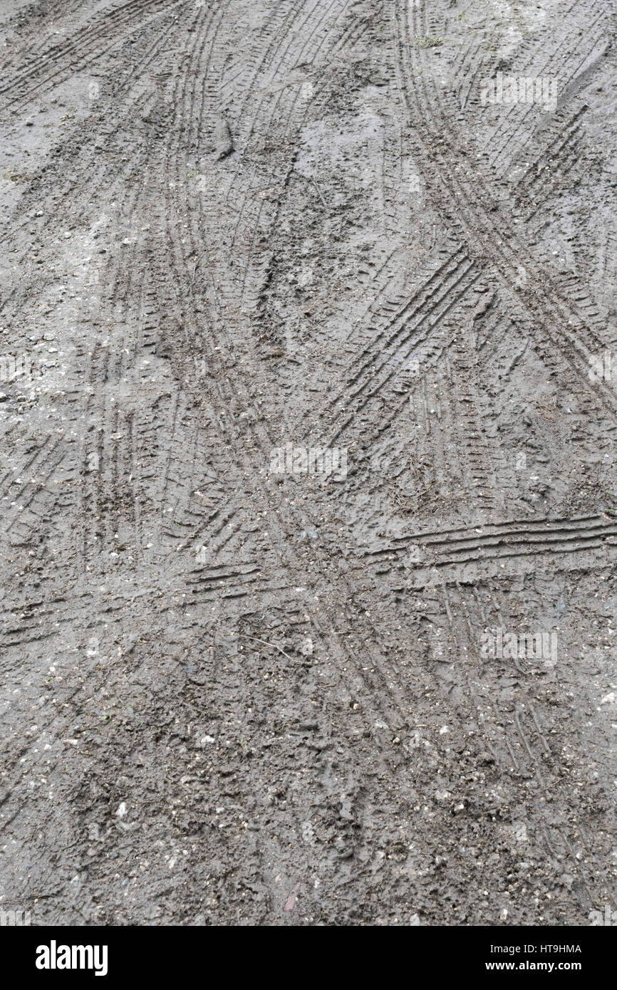 Tyre tracks / tire marks in muddy country lane, dirt, muddy texture ...