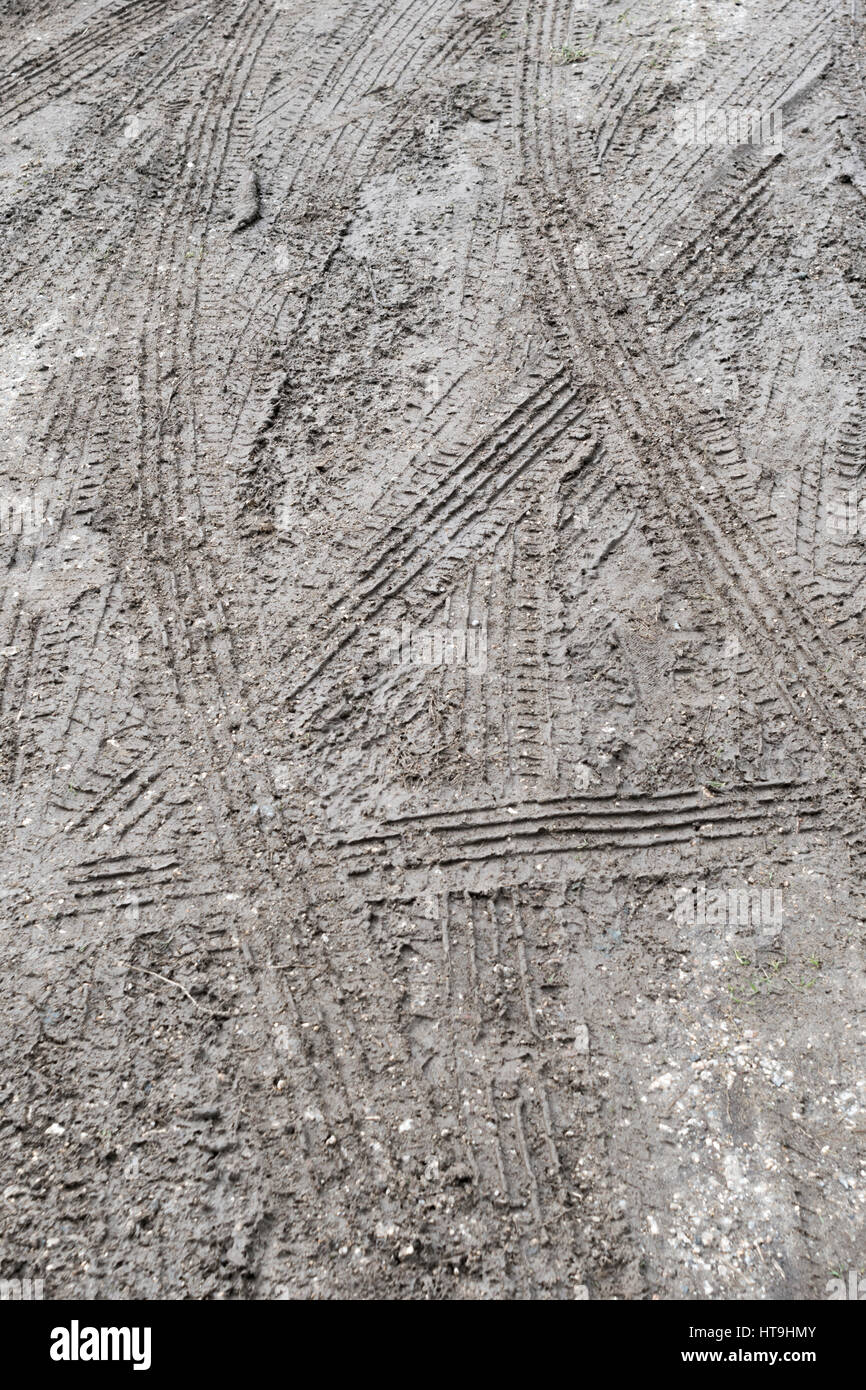 Tyre tracks / tire marks in muddy country lane, dirt, muddy texture ...