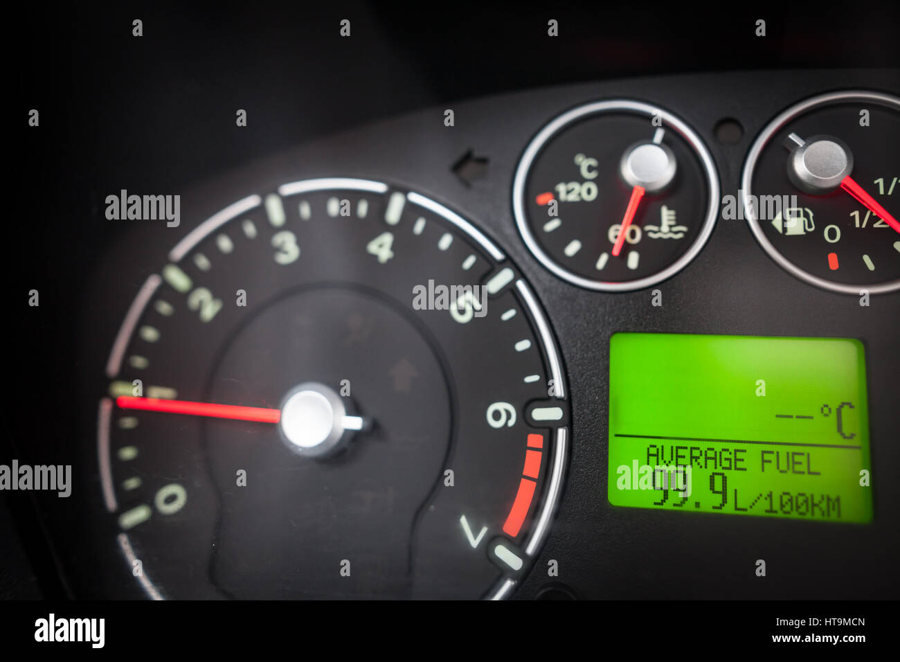 Close up image of a car's dashboard indicating a very high fuel ...