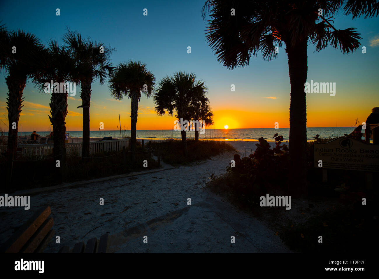 Indian Rock Beach Florida Sunset with beach sand walkway Stock Photo ...