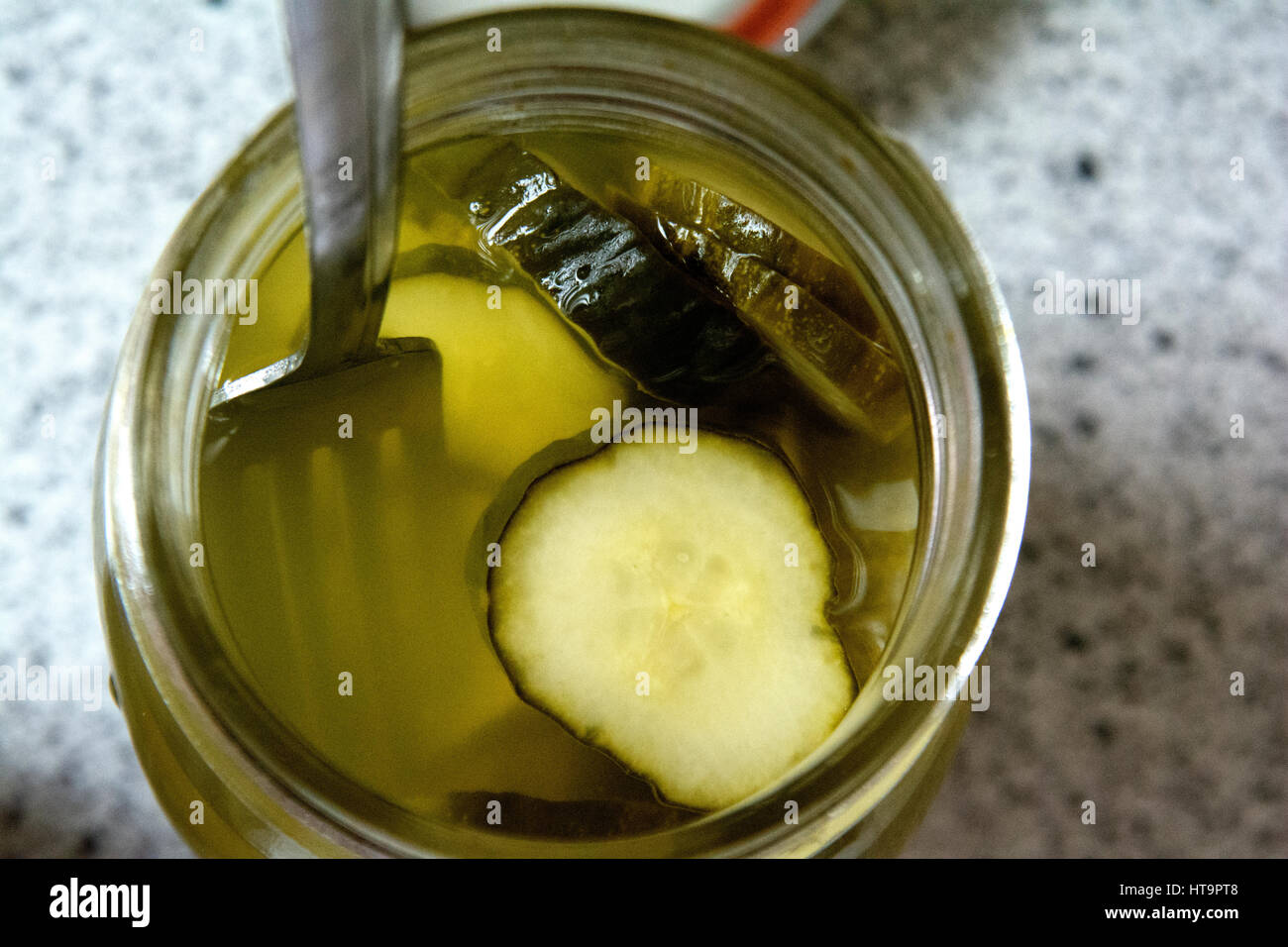 home made pickles in a glass jar close up Stock Photo - Alamy
