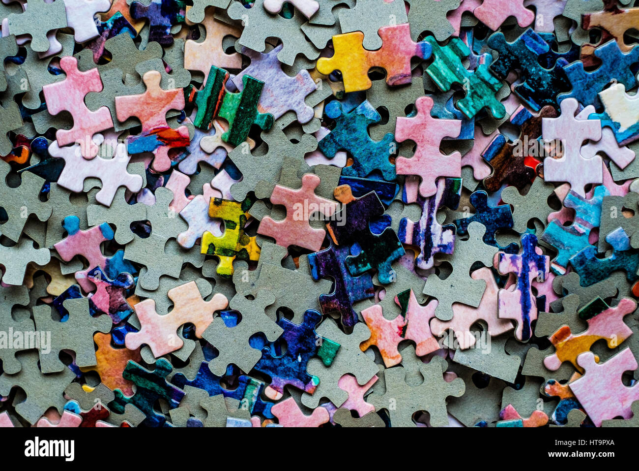 Puzzle set colored background Stock Photo - Alamy