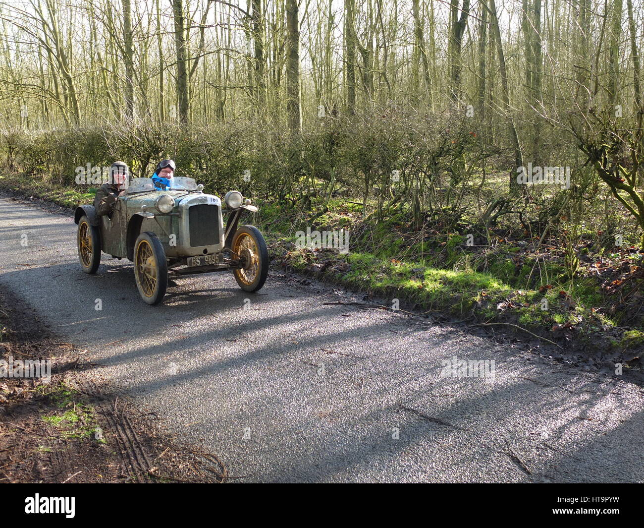 Vintage Austin Ulster Trials car driving on a country road - taken at ...